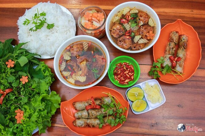 Hanoi Jeep After Dark Foodie Tour and Train Street Experience - A Culture and History Mix