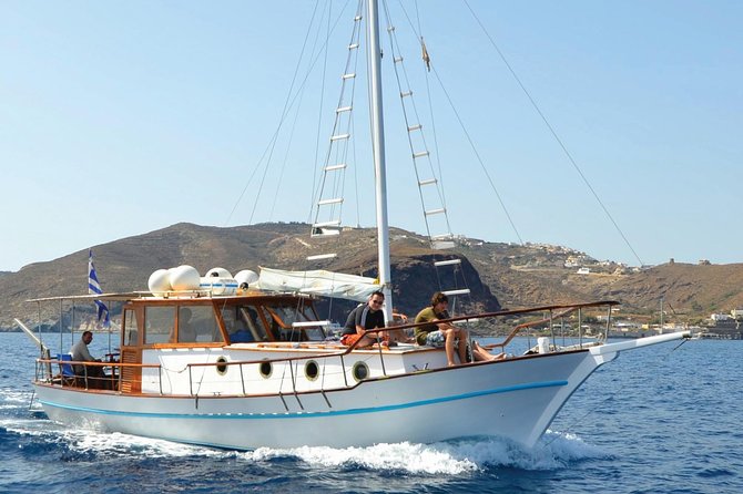 Santorini Caldera Sunset Traditional Cruise With Meal and Drinks - Pricing and Booking
