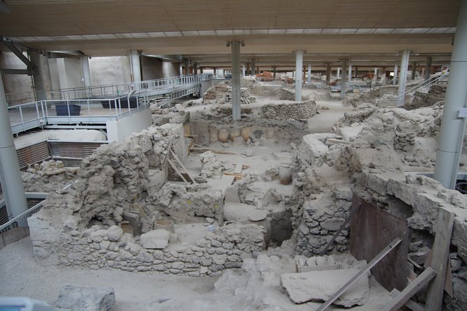 Archaeological Bus Tour to Akrotiri Excavations & Red Beach - Experiencing the Local Culture