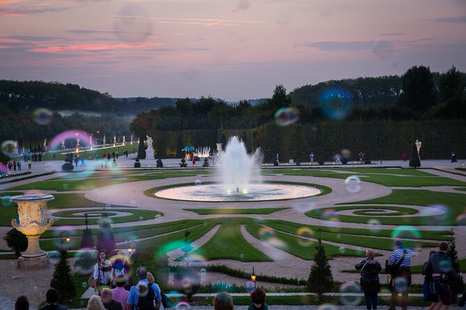 Versailles Palace Audio-Guided Tour by Shuttle From Paris - Booking Information and Availability