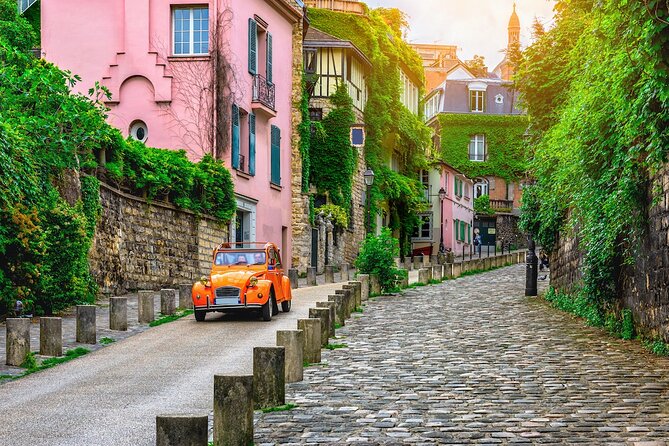 Montmartre and Sacre Coeur Private Guided Tour in Paris - Stop 1: Moulin Rouge and Nearby Highlights