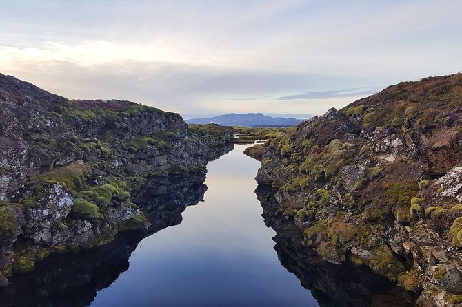 Silfra Drysuit Snorkeling Tour with Free Photos - From Reykjavik - Authenticity and Stunning Views