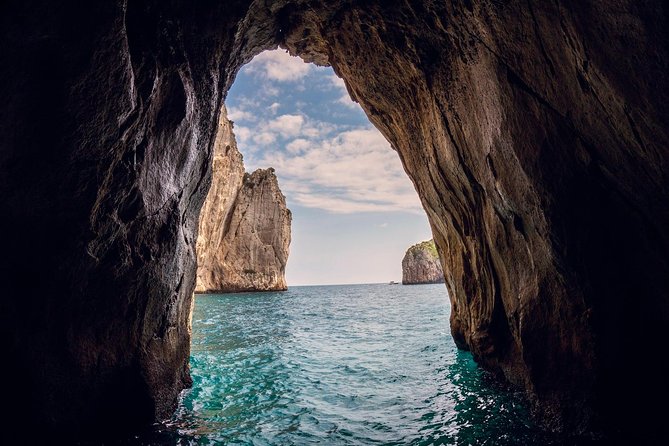 Small Group Capri Island Boat Ride with Swimming and Limoncello - The Joy of Swimming and Snacking