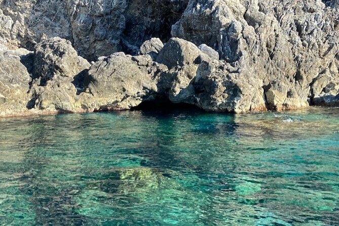 Sunset aperitif on a boat in Scilla - The Sum Up: A Relaxing, Scenic Escape in Calabria