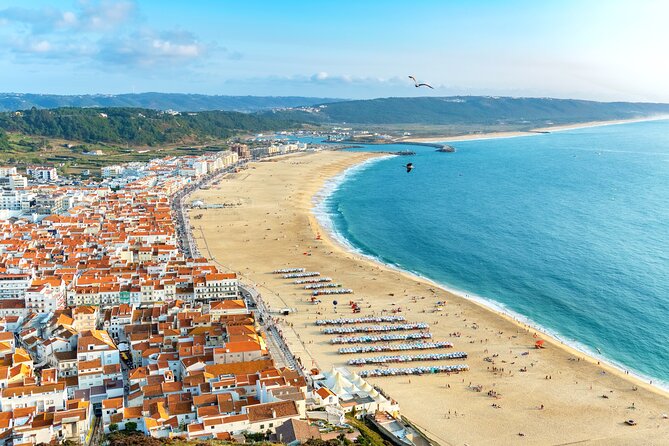 Transfer Tour Porto/Lisbon with 2 stops options Óbidos, Nazaré, Fátima, Coimbra - Who Should Consider This Experience?