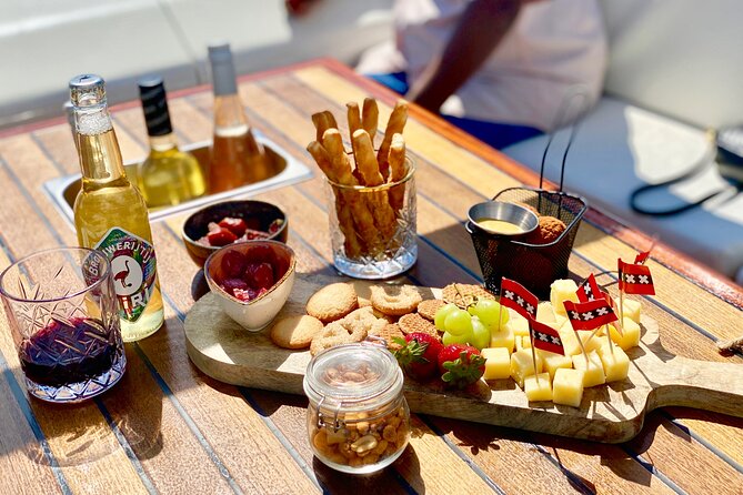 Amsterdam Small-Group Canal Cruise Including Snacks and Drinks - Who Will Love This Tour?