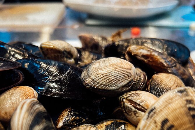 Authentic Barcelona Cooking Class: Market Tour & Paella Workshop - Frequently Asked Questions