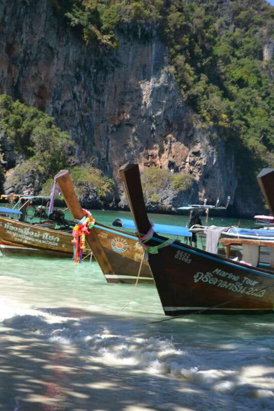 From Phi Phi: Full Day by Longtail Boat with Sunset - The Sum Up