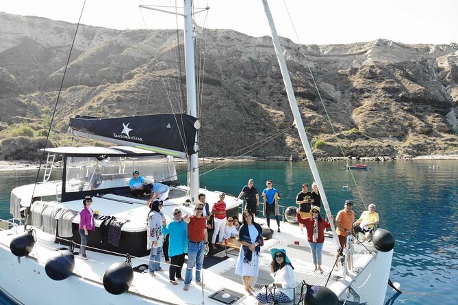 Half-Day Exclusive Catamaran Cruise in Santorini with Meal and Open Bar - Practical Details and Value