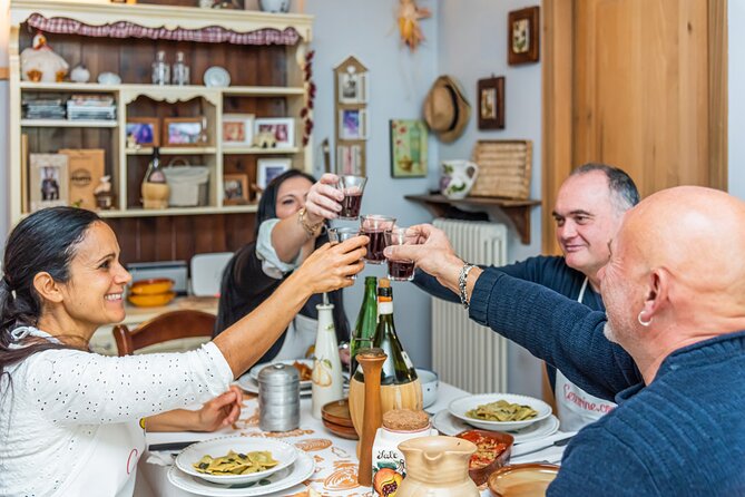 Lucca Walking Tour & Traditional Cooking Class with Wine - Enjoying Your Meal with Regional Wine