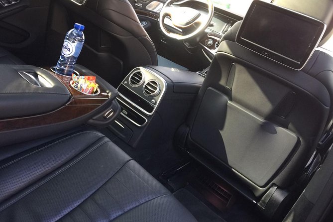 Private Arrival Transfer from Brussels Airport to Bruges with Business car - The Beauty of the Journey