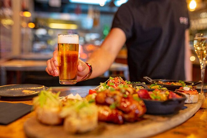 Tasty Tapas & Drinks Tour with a Rooftop Included - Rooftop with a View: Placa de la Cebada