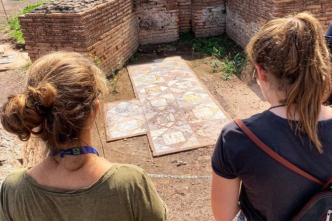 Walking Tour at The Colosseum and Forum with an Archaeologist - Authentic Experiences and Practical Details