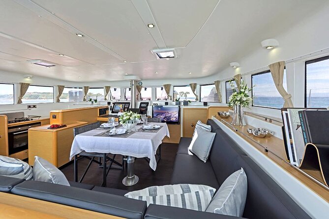 Mykonos Catamaran Daytime or Sunset Tour, 8-flavor Meal & Drinks - The Sum Up