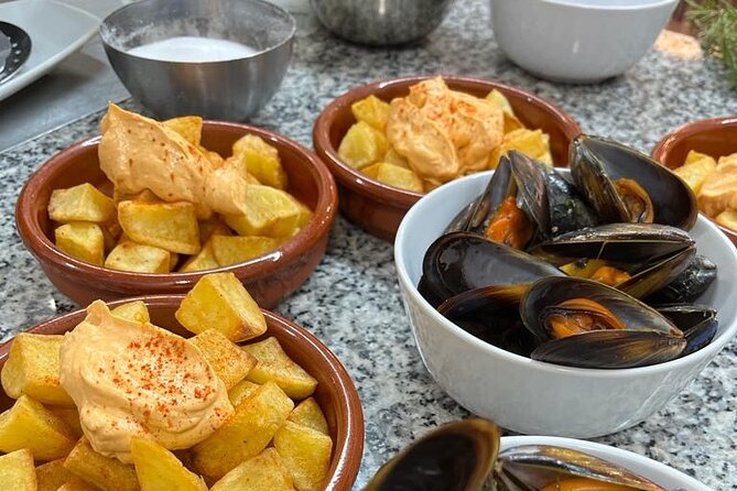 Valencian paella cooking class, tapas and visit to Ruzafa market. - Authenticity and Cultural Significance