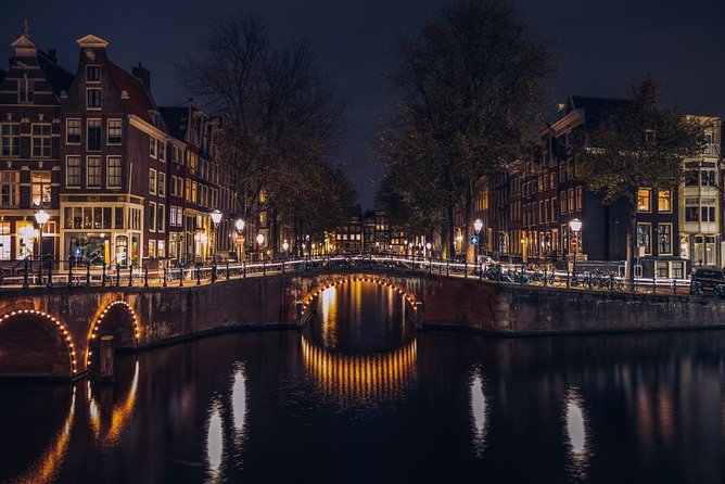 Amsterdam Layover: Walking Tour & Canal Cruise + Airport Transfer - The Sum Up