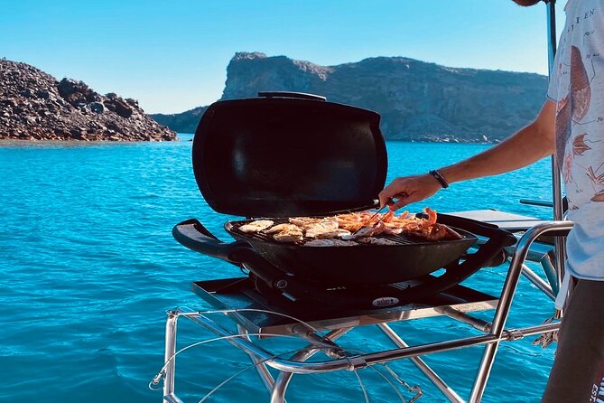 Half-Day Exclusive Catamaran Cruise in Santorini with Meal and Open Bar - FAQs