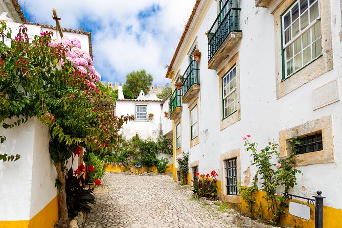 Three Cities in One Day: Porto, Nazare and Obidos from Lisbon - FAQs