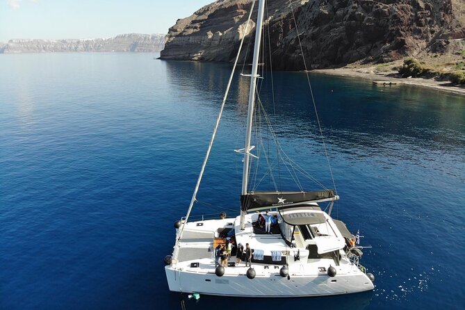 Half-Day Exclusive Catamaran Cruise in Santorini with Meal and Open Bar - What to Expect on This Santorini Catamaran Cruise
