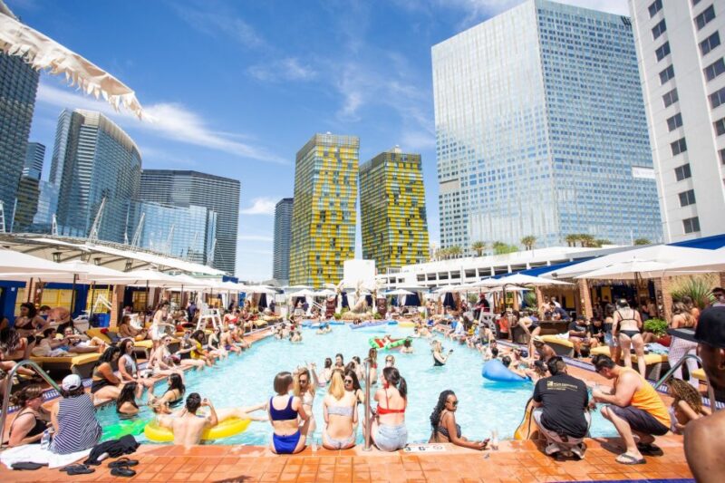 Las Vegas: Party Bus Day Club Tour with Drinks & Club Entry - Key Points