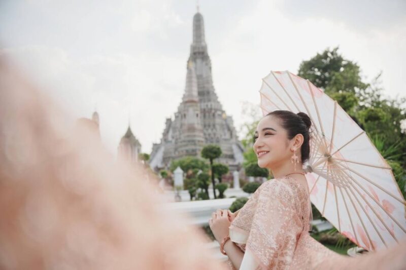Photoshoot in Thai Costume - A Colorful Photoshoot in Thai Costume at Wat Arun – An Authentic & Fun Experience