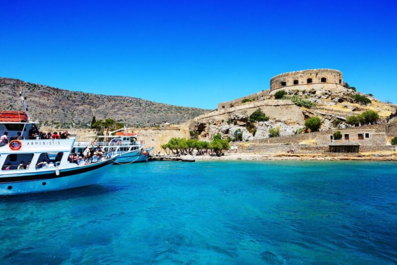 Elounda: Spinalonga Guided Boat Tour with BBQ and Swimming - The Itinerary: From Elounda to Spinalonga and Beyond