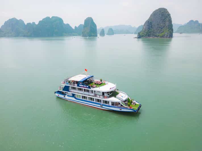 Hanoi: Halong Bay Day Trip with Sunset Party - Exploring Sung Sot Cave: Nature’s Art Gallery