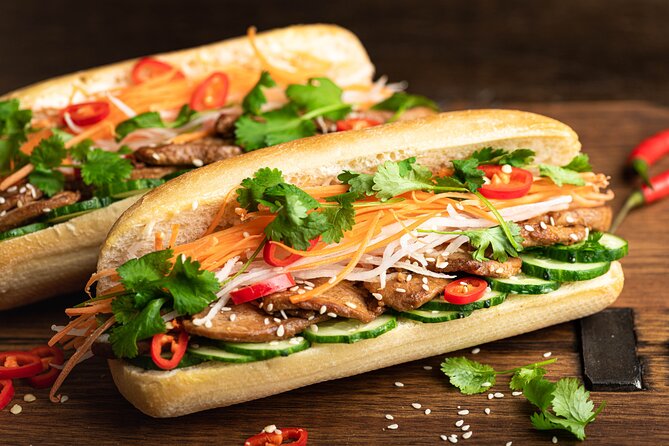 Saigon By Night and Vietnam Local Food on Motorbike - Authentic Experiences and Pacing