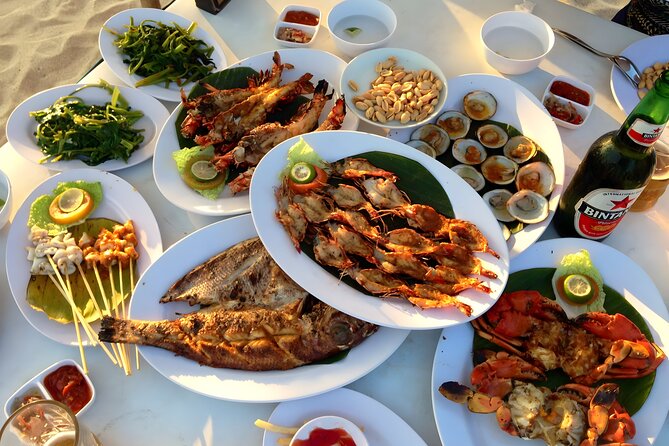 Uluwatu Sunset Trip with Kecak Dance Show and Jimbaran Dinner - Jimbaran Beach: A Seafood Feast by the Sea