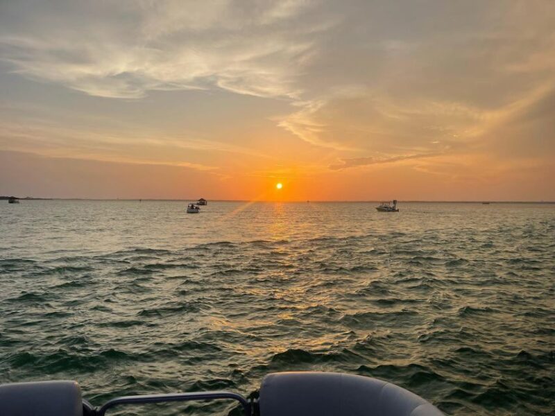 Florida: Emerald Coast Sunset & Dolphin Cruise with Guide - Detailed Breakdown of the Itinerary