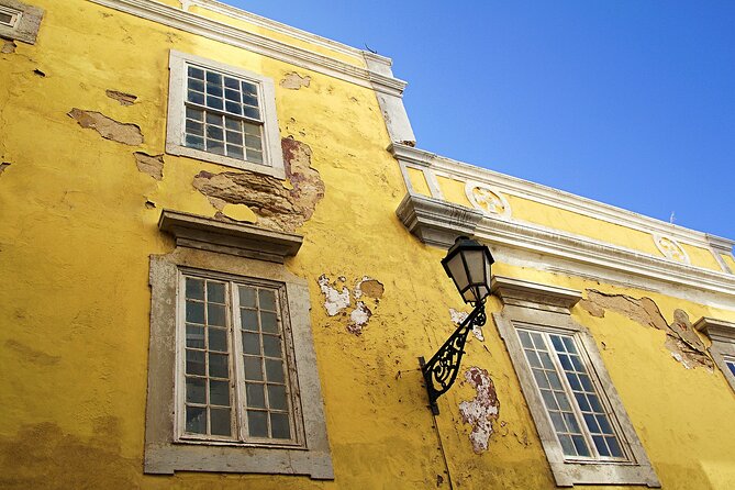 Private transfer from Lisbon to Faro with 2 hours for sightseeing - The Sum Up