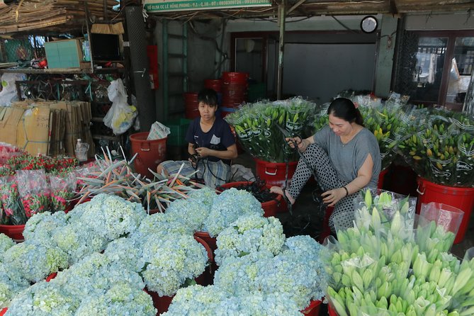 Saigon Unseen and Food Tour by Motorbike - Coffee, Flowers, and Market Madness