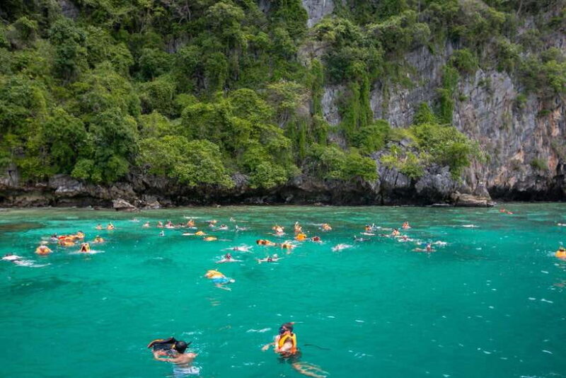 Koh Phi Phi: One Day Tour by Longtail Boat with Sunset - The Sum Up