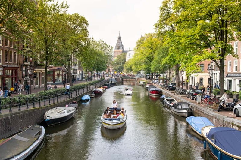 Amsterdam: Open Boat Tour of Canals with Expert Local Guide - Itinerary Breakdown: What You Will See and Do