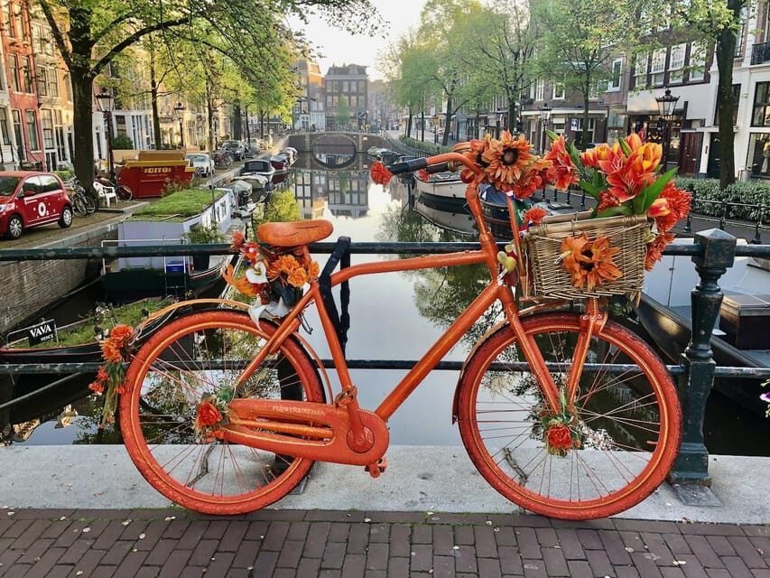 Amsterdam: Small Group Walking Tour with Fun Guide - Detailed Breakdown of the Itinerary