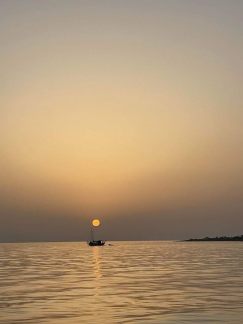 Argostoli: Sunset Cruise with Swim Stops, Dinner, and Wine - Itinerary Breakdown