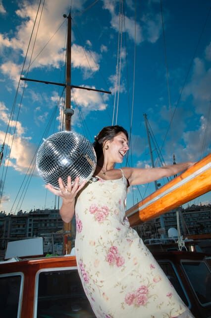 Athens: Mamma Mia Sunset Cruise with Welcome Drink - Key Points