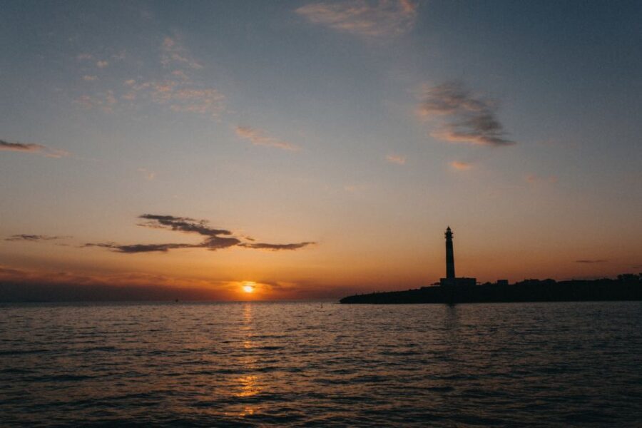 Cala'n Bosch: 2-Hour Sunset Sightseeing Tour - Highlighted Landmarks and Stops