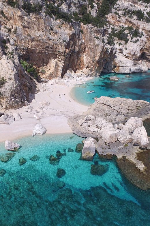 From Arbatax: Full-Day Guided Boat Tour of the Baunei Coast - The Experience on Board