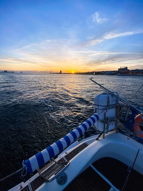 Lisbon: Sunset boat tour with wine - The Experience: Sunset, Sights, and Sip