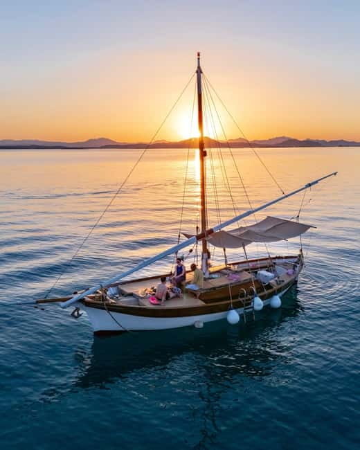 Porto San Paolo: Vintage Cruise Sunset Aperitif to Tavolara - Key Points