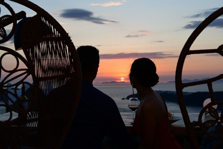 Santorini: Private Romantic Sunset Dinner with Caldera View - The Views and Atmosphere