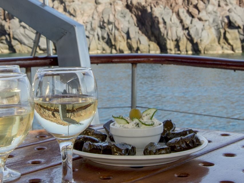 Santorini: Traditional Wooden Boat Tour with Meal and Wine - Who Should Consider This Tour?