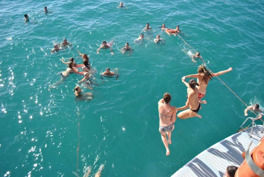 Valencia: Catamaran Cruise, Paella Lunch and Swim Stop - Authentic Experiences and Traveler Feedback