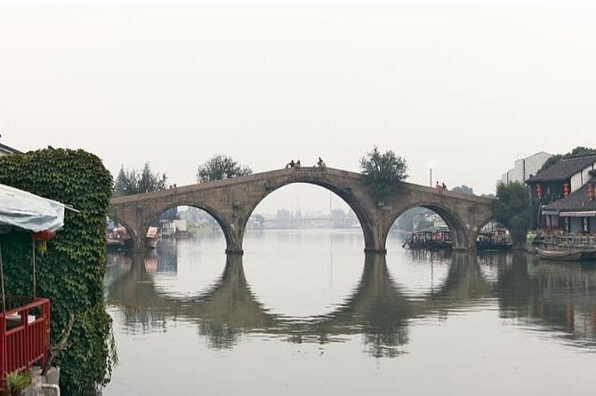 All-inclusive Shanghai City Highlights and Zhujiajiao Water Town Combo Day Tour - Transportation and Guide