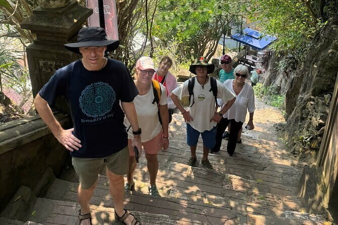 HoiAn/DAD: Marble Mountains, Am Phu Cave & Huge Lady Buddha Tour - Admiring the Lady Buddha at Linh Ung Pagoda
