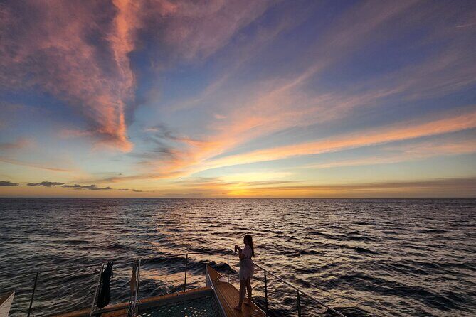 Oahu Private Sunset Snorkel and Dolphin Watch with Hot Buffet - Sunset and Dinner on Deck