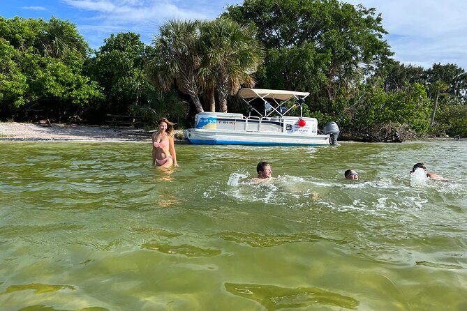 Swimming in a Dolphin and Manatee Lagoon Boat Tour - The Sum Up