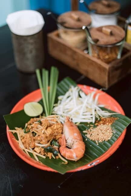 Bangkok: Night Food Tour with Tuk-Tuk and Riverboat - Breakdowns of the Itinerary