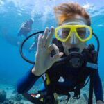 Baptism diving in the turquoise waters of Tahiti - The Practical Details